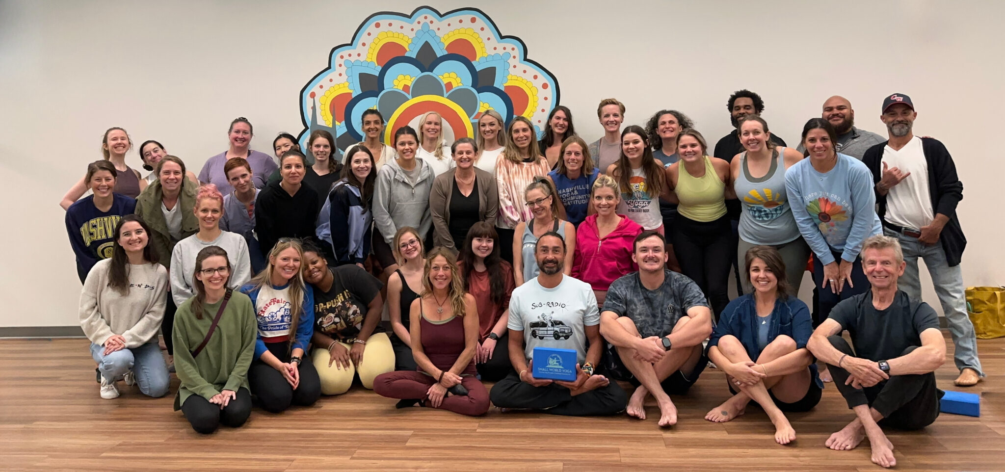 Small World Yoga – Connecting People. Creating Community.
